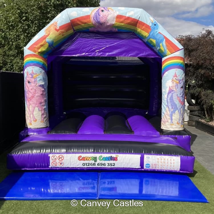 12ft x 12ft Black and Purple Unicorn Bouncy Castle - Bouncy Castle Hire ...