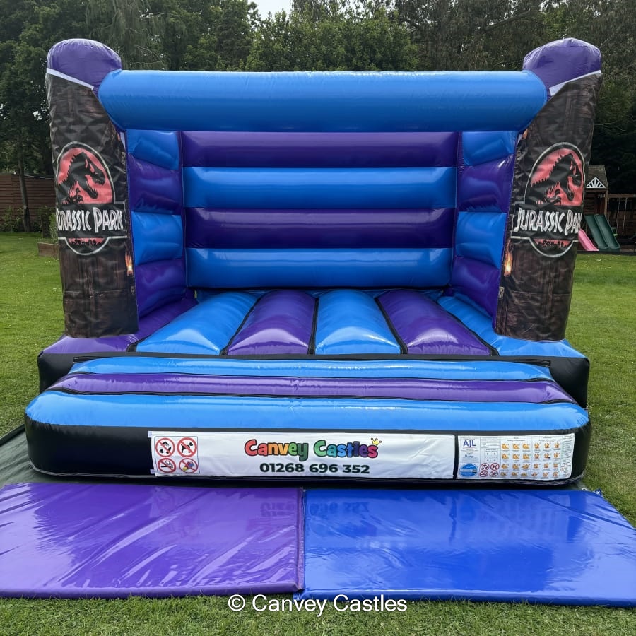 12ft x 12ft Blue and Purple Jurassic Park Low Height Bouncy Castle ...