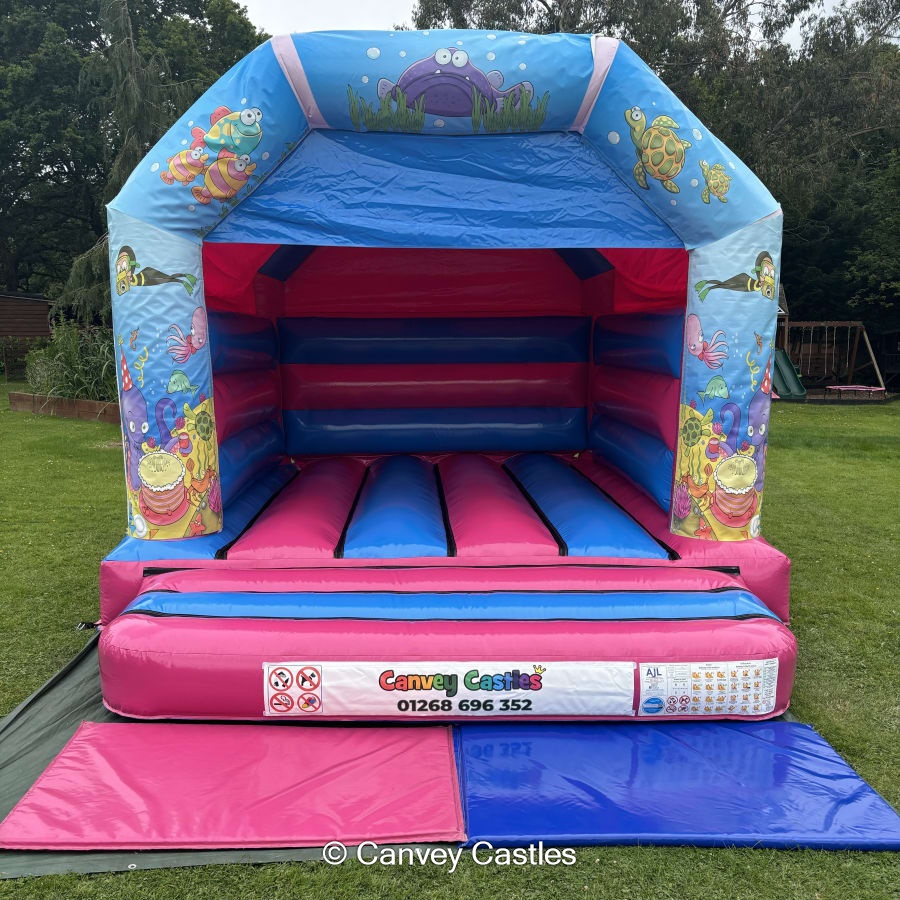 12ft x 15ft Blue and Pink Under the sea Bouncy Castle - Bouncy Castle Hire in Essex | Canvey Castles