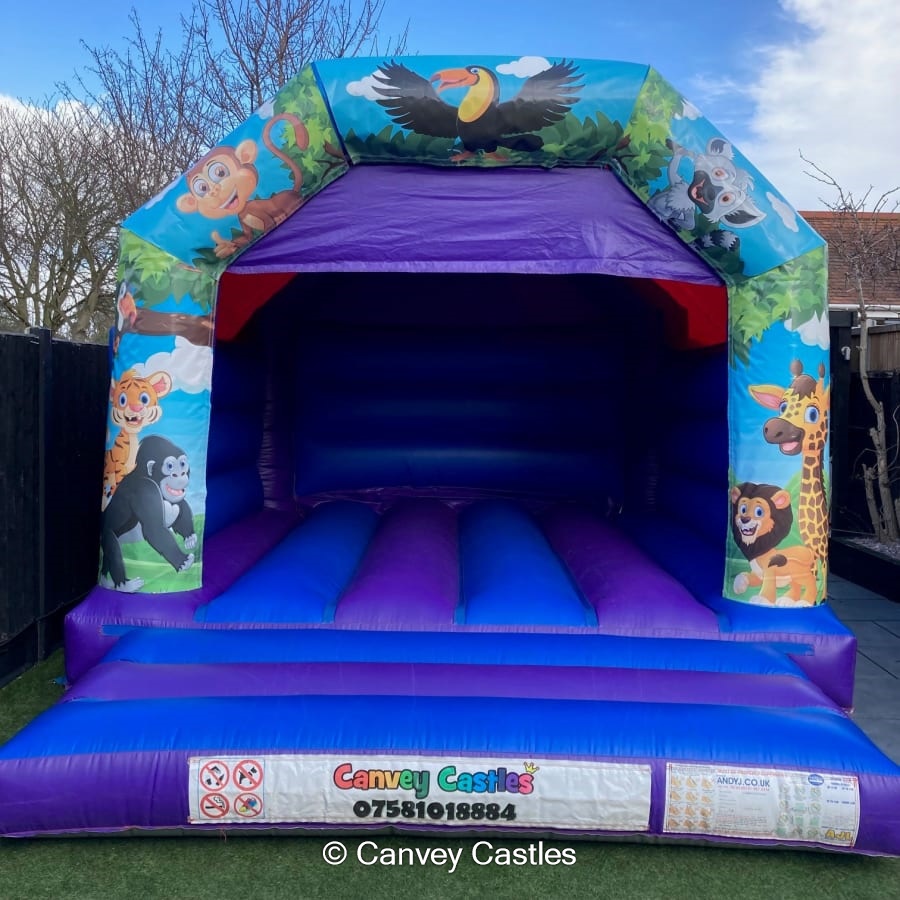 12ft x 15ft Blue and Purple Jungle Bouncy Castle - Bouncy Castle Hire ...