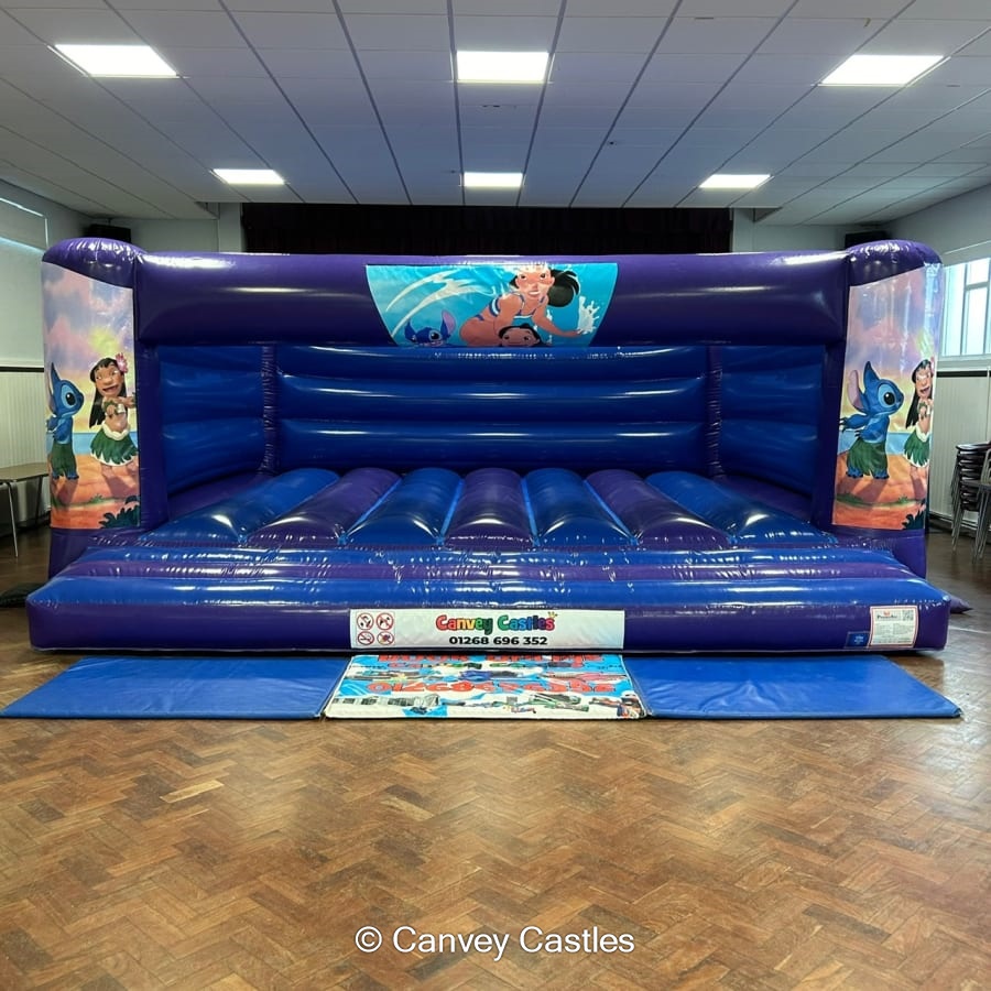 19ft x 18ft Blue and Purple Lilo and Stitch Bouncy Castle (low height ...