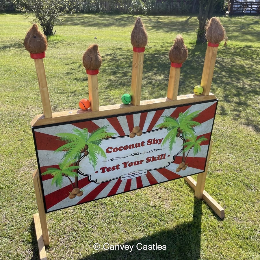 Coconut shy carnival game - Bouncy Castle Hire in Essex | Canvey Castles